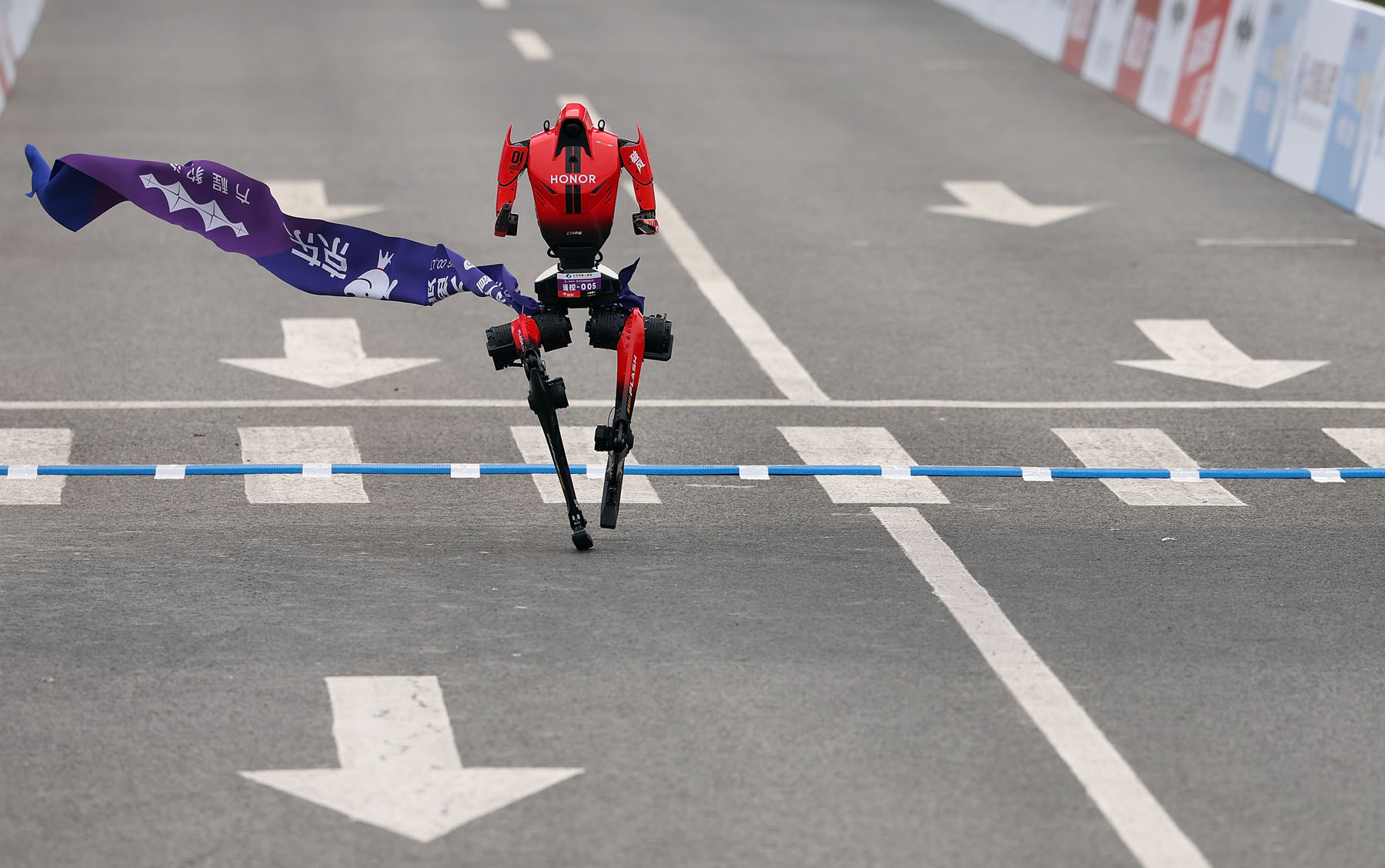 Humanoid robot beats human half-marathon world record in Beijing ...